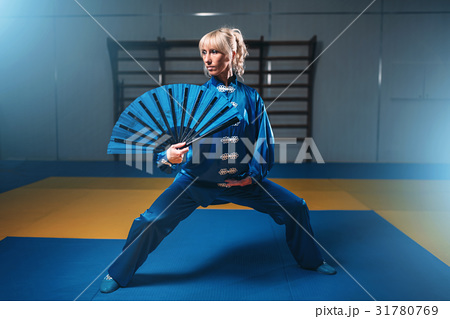 Female wushu master with fan, martial arts | materials | digitalstage